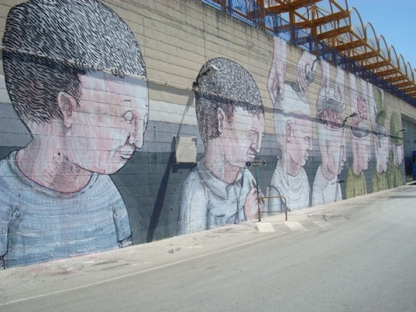 ‘Brainwashing Soldiers’ mural by Italian street artist Blu – Impact Lab